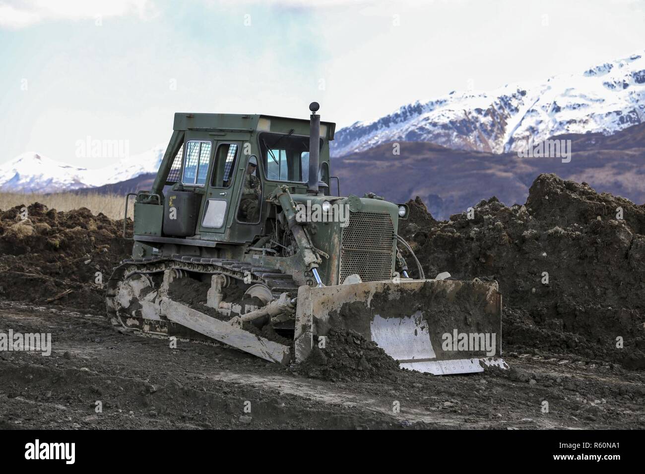 Alaska Guardsman Sgt. Jeffery Enderle, a horizontal equipment ...