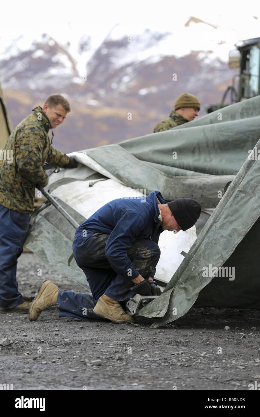Alaska Guardsman Spc. Travis Cooper, a wheeled vehicle mechanic, 207th ...