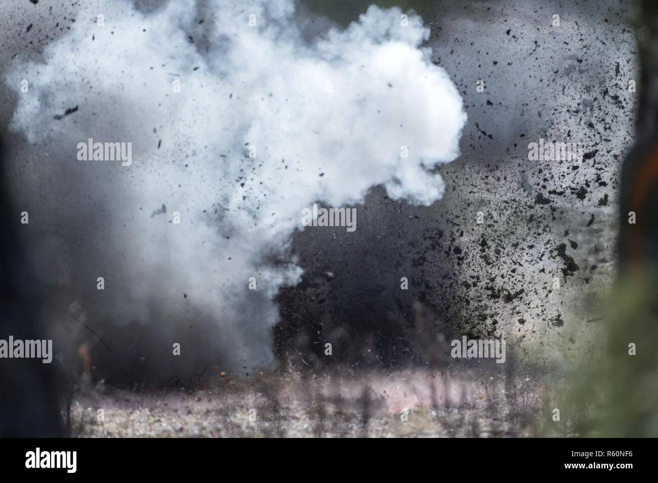 A M18 Claymore mine explodes after being detonated by paratroopers ...
