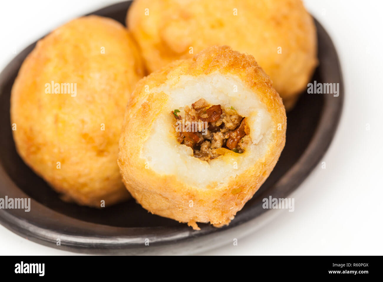 Preparation steps of traditional Colombian dish called stuffed potatoes ...