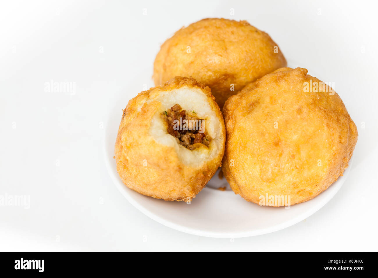Preparation steps of traditional Colombian dish called stuffed potatoes ...