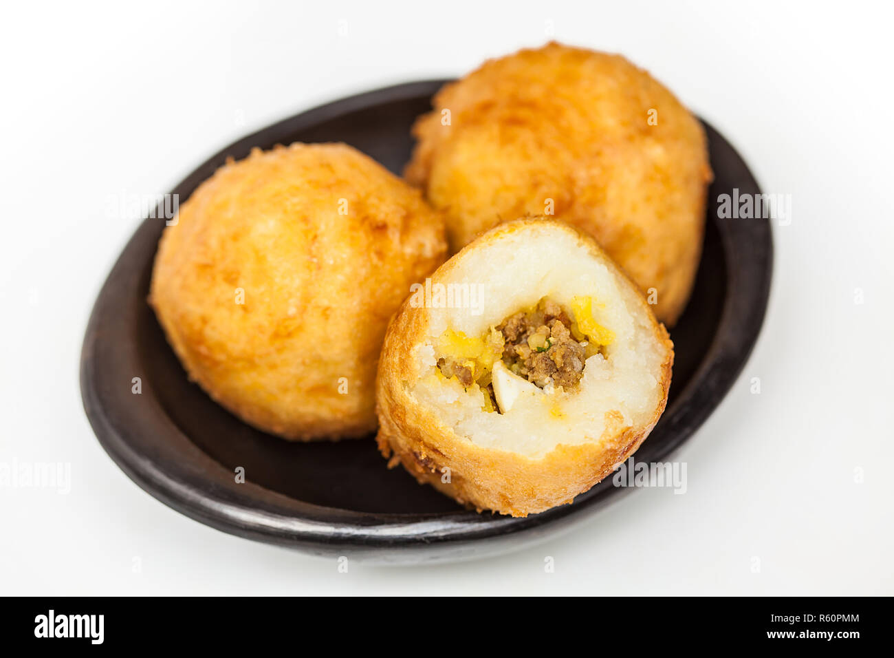 Preparation steps of traditional Colombian dish called stuffed potatoes ...