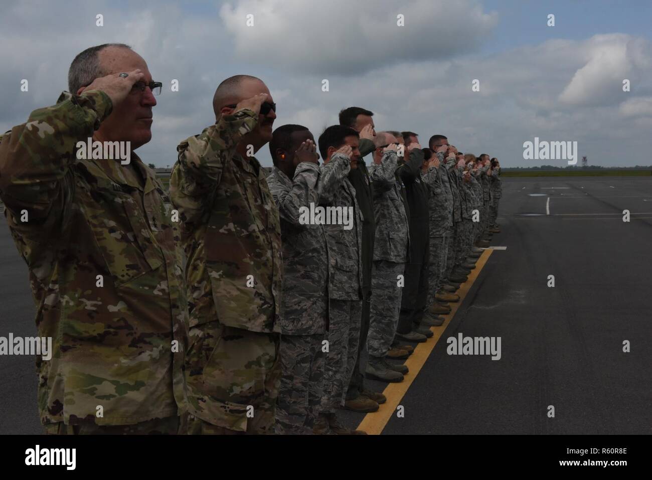 From left, Maj. Gen. Gregory A. Lusk, Command Sgt. Maj. John H. Swart ...