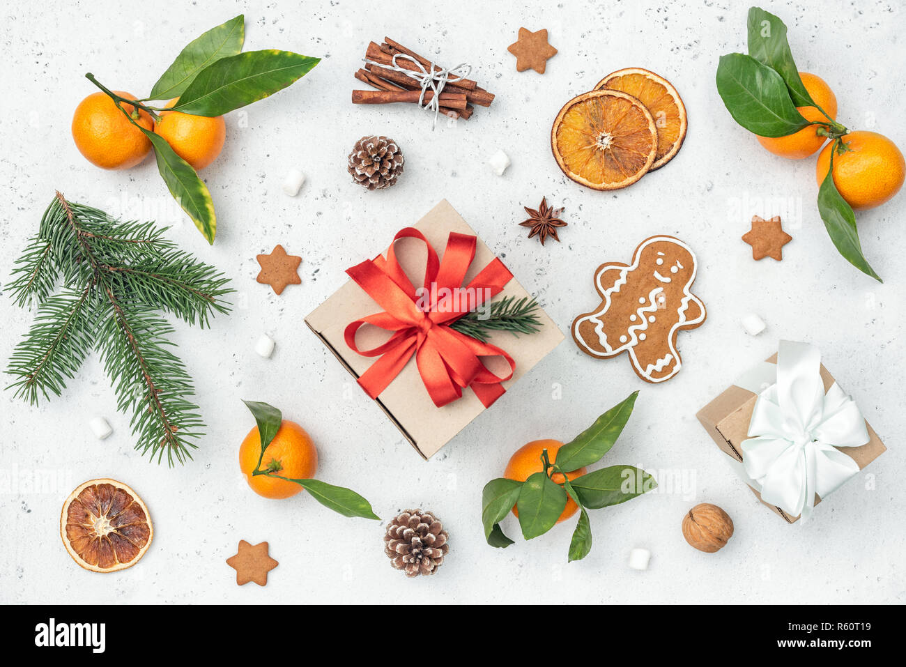 Christmas winter flat lay with gingerbread, cinnamon, fir tree, gift ...