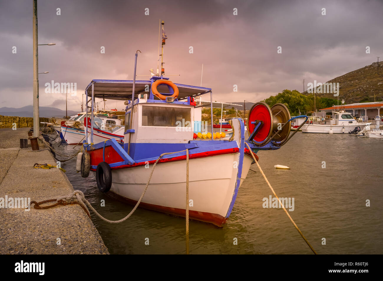 Fishing boat in a port of Crete Stock Photo - Alamy