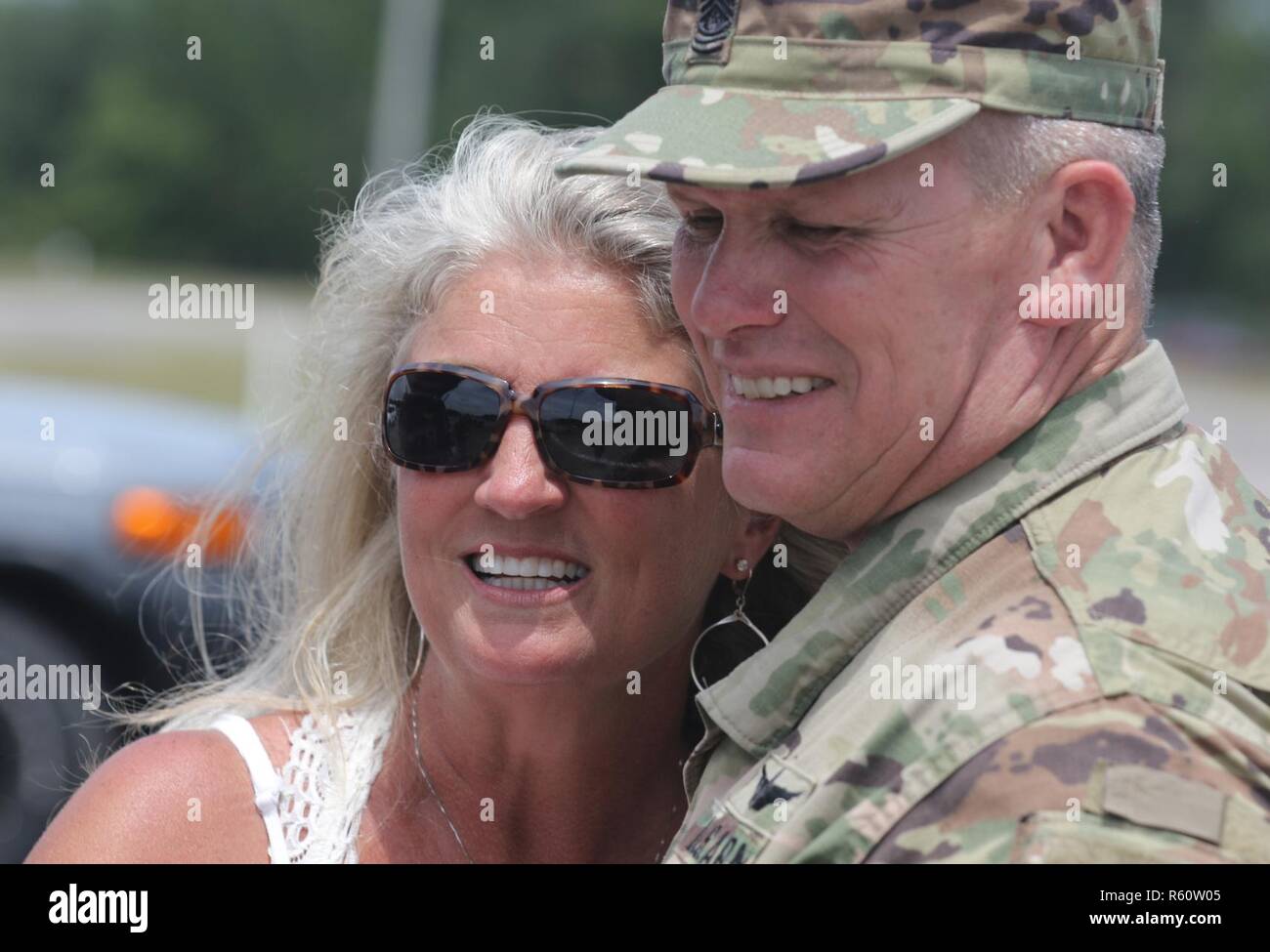 Command Sgt. Maj Scott Reed reunites with his wife, Angie, at ...