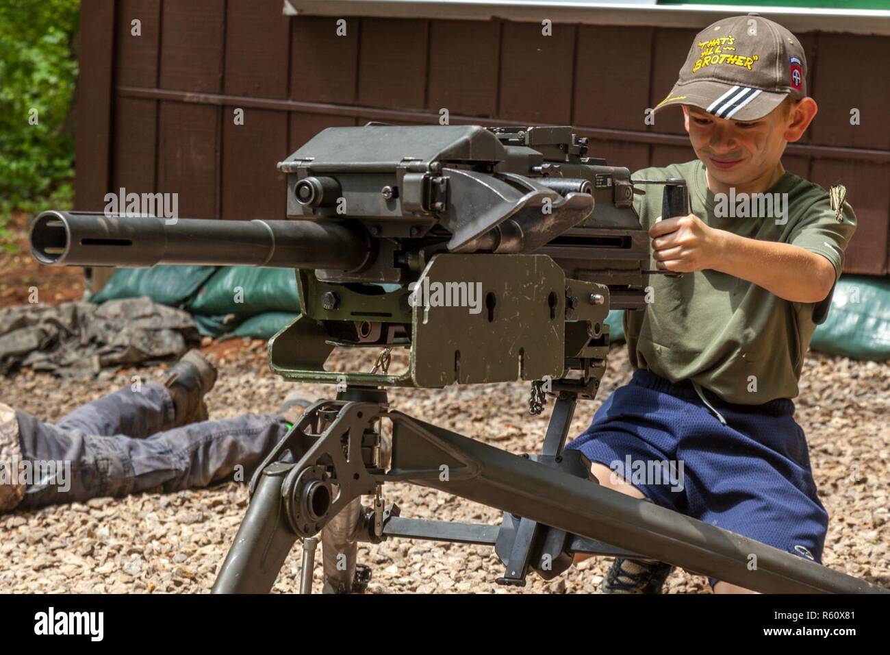 A guest examines a MK-19 40mm grenade launcher during the 5th RTB Open ...