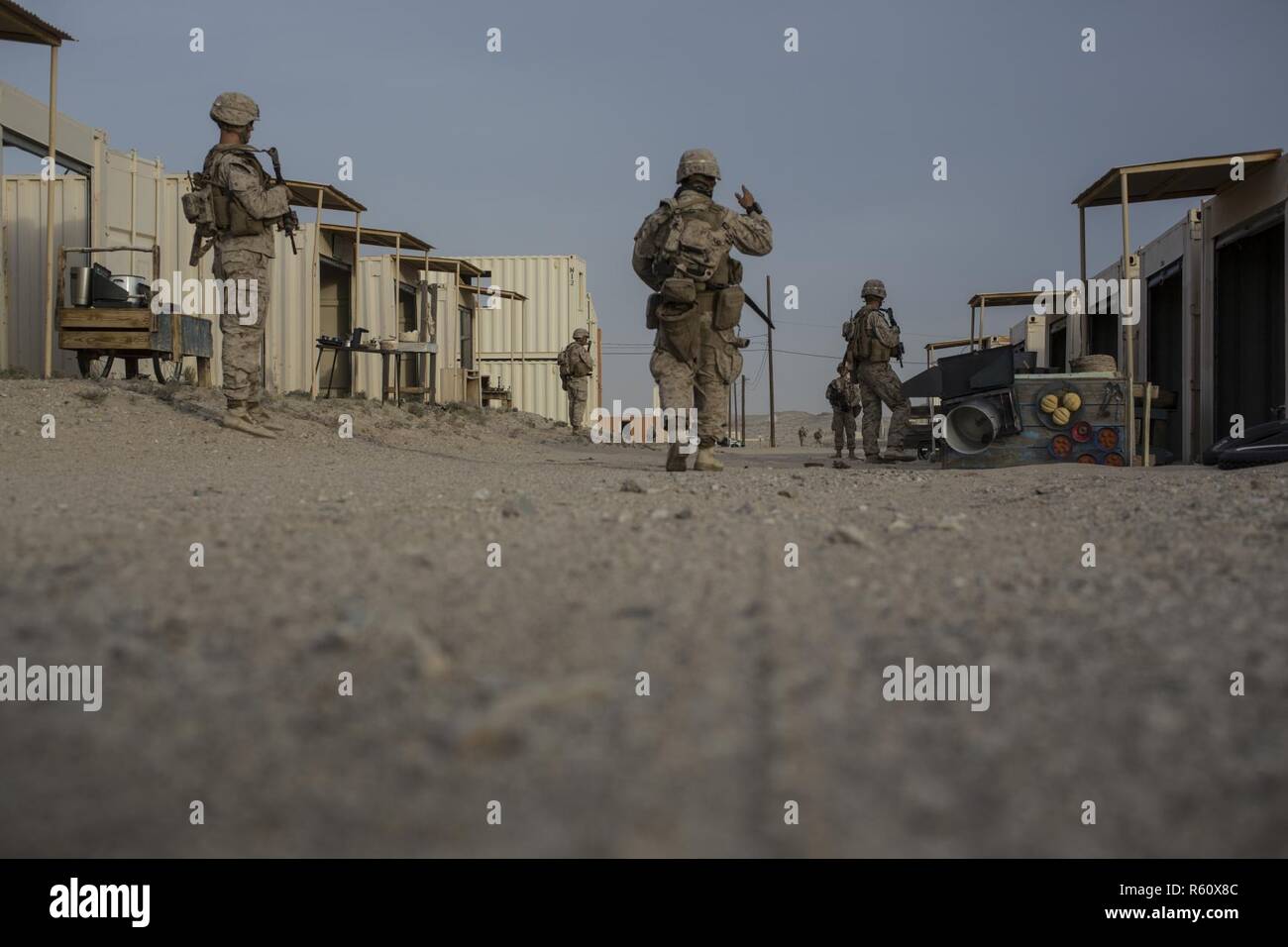 U.S. Marine Corps Sgt. Brayn U. Bedoya, center, a mortarman, with ...