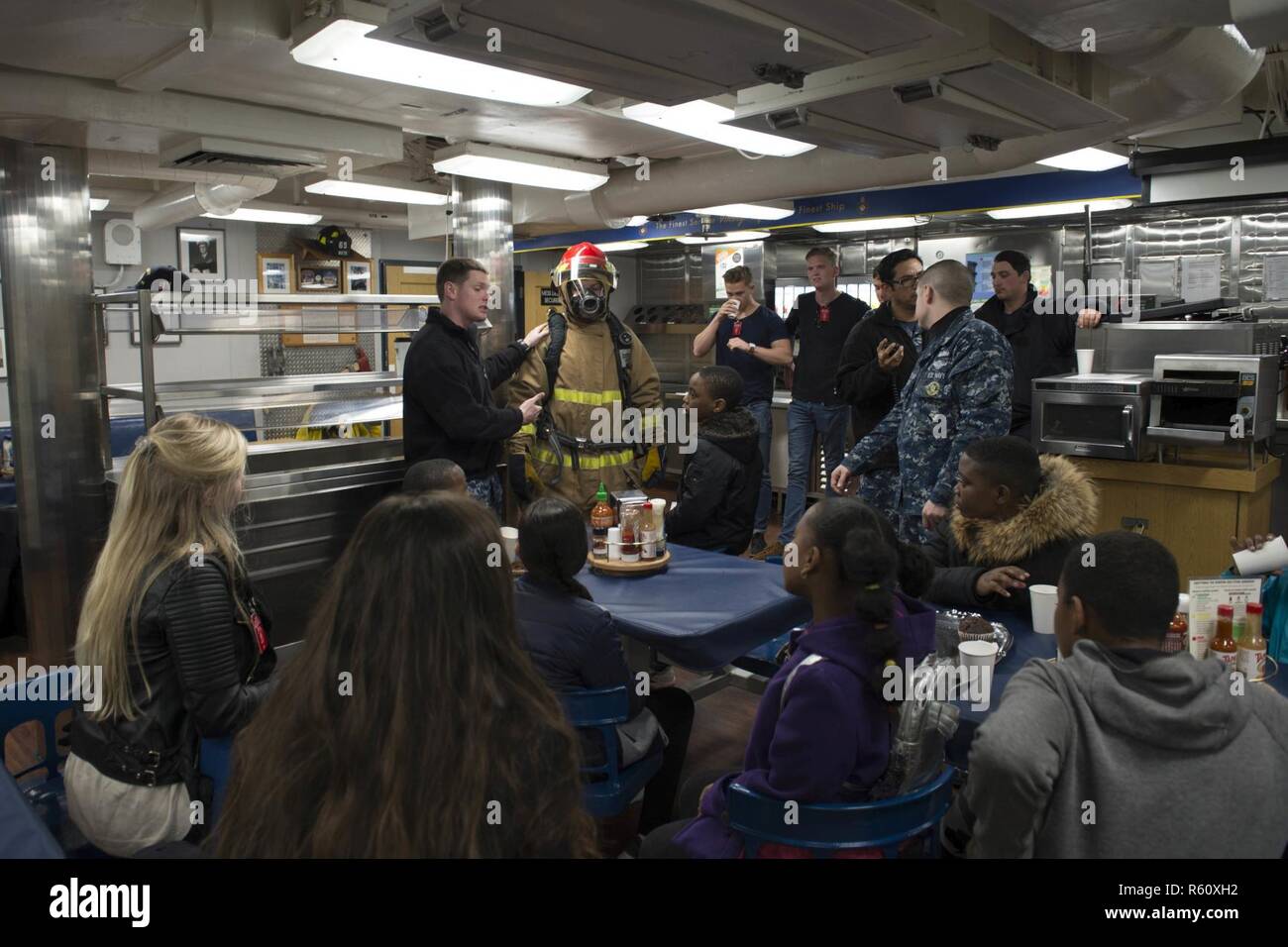 AMSTERDAM (April 30, 2017) - Ensign Logan O'Shea shows children damage ...