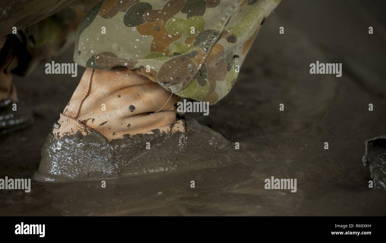An Australian Army carpenter pours floor concrete during Balikatan 2017 ...
