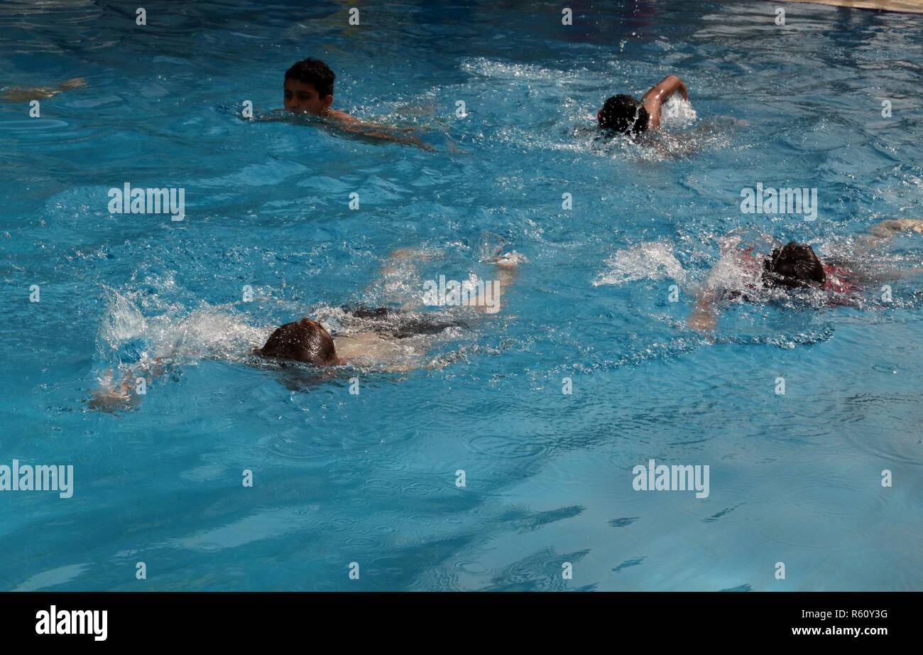 Boy Scouts of Troop 965 Kuwait swim continuously for 150 yards using ...