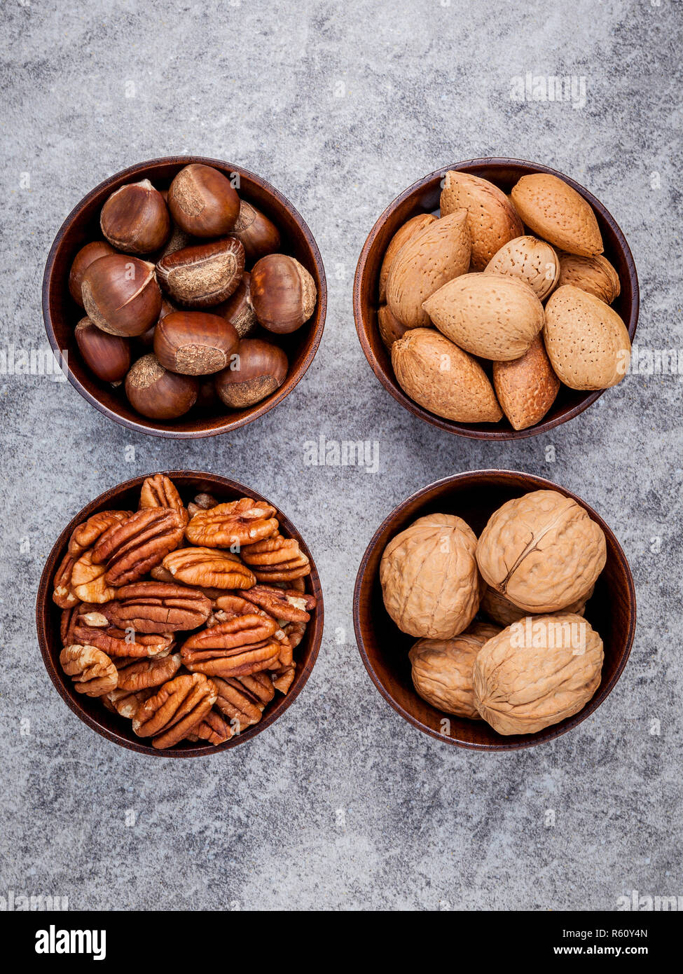 Whole almonds,whole walnuts ,whole hazelnut and pecan nuts in wooden ...