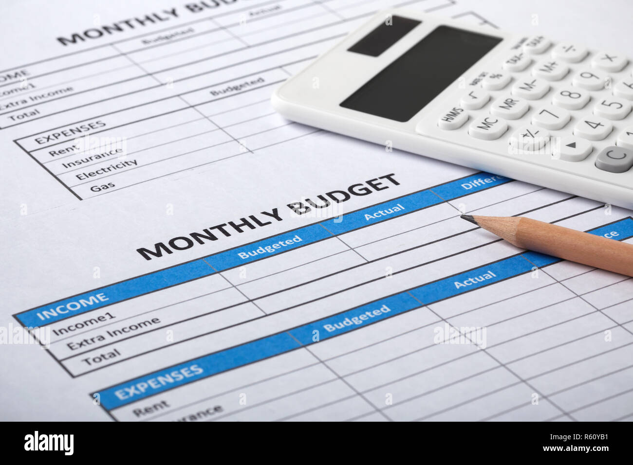 Monthly budget concept with monthly budget sheet and white calculator ...