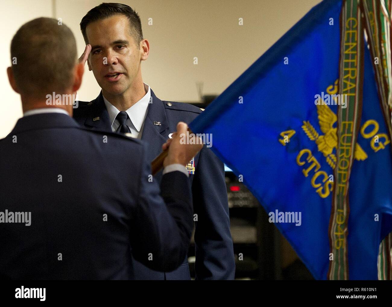 U.S. Air Force Maj. Hamilton Underwood salutes U.S. Air Force Lt. Col ...