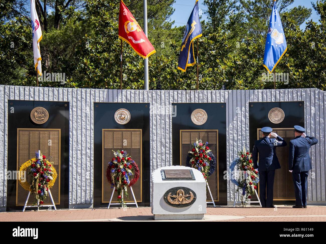 Chief Master Sgt. Martin Cortez and Lt. Col. Emil Rebik salute the list ...