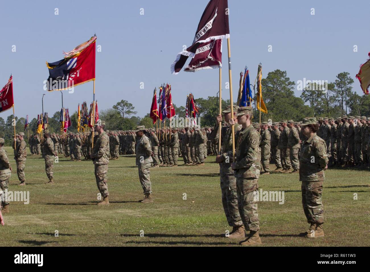 Brigade color bearers of 3rd Infantry Division stand at present arms ...