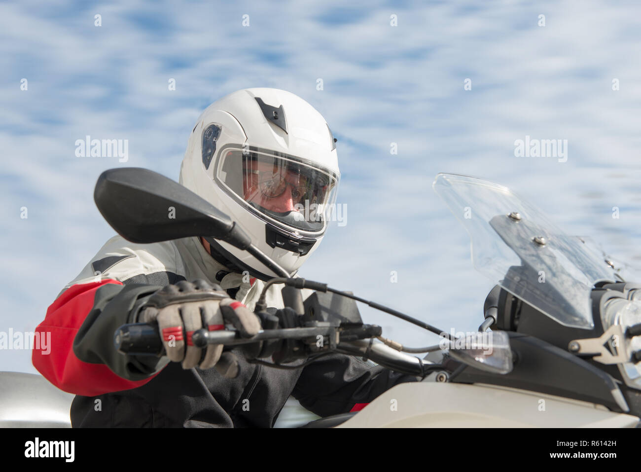 Older man on a motorbike hi-res stock photography and images - Alamy