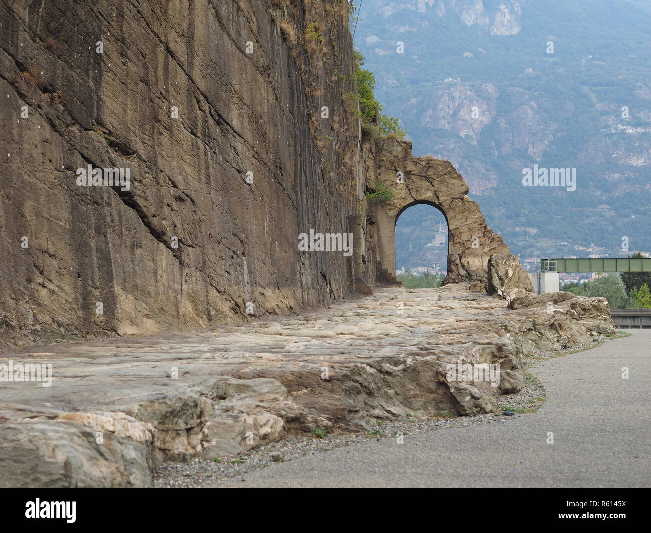 Ancient roman road arch in Donnas Stock Photo - Alamy