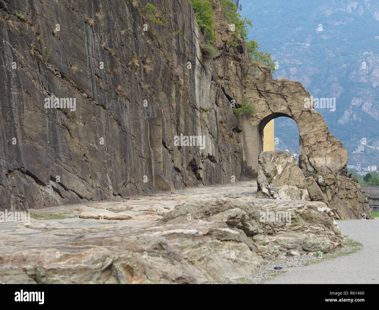 Ancient roman road arch in Donnas Stock Photo - Alamy