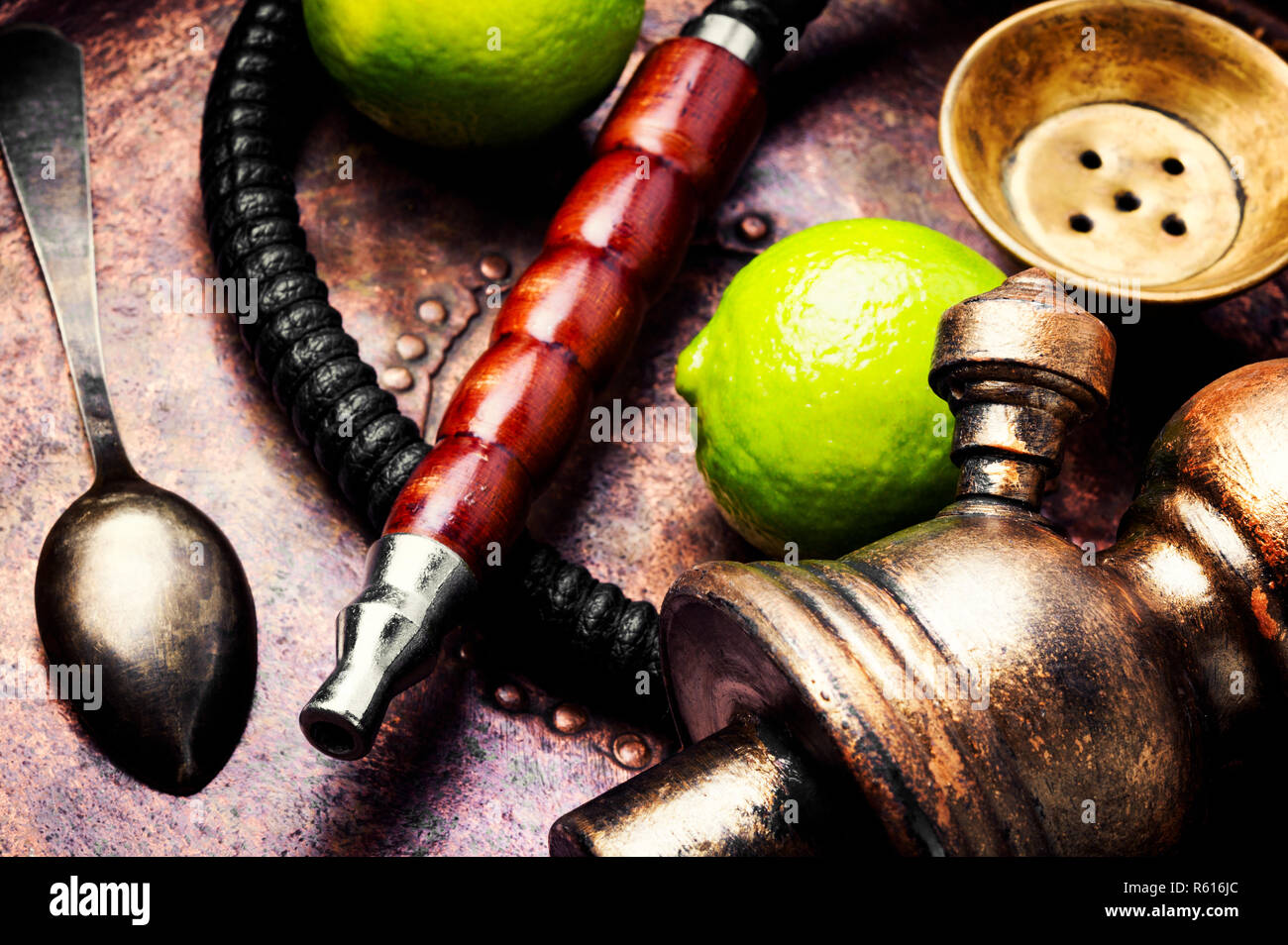 Eastern smoking hookah with mouthpieces with lime flavor.Shisha ...