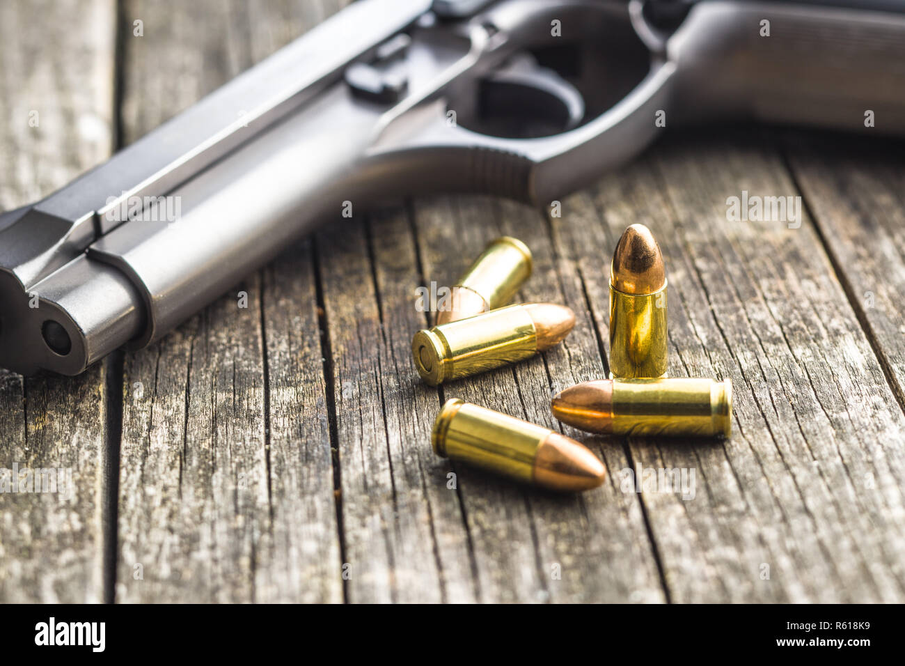 9mm pistol bullets and handgun Stock Photo - Alamy