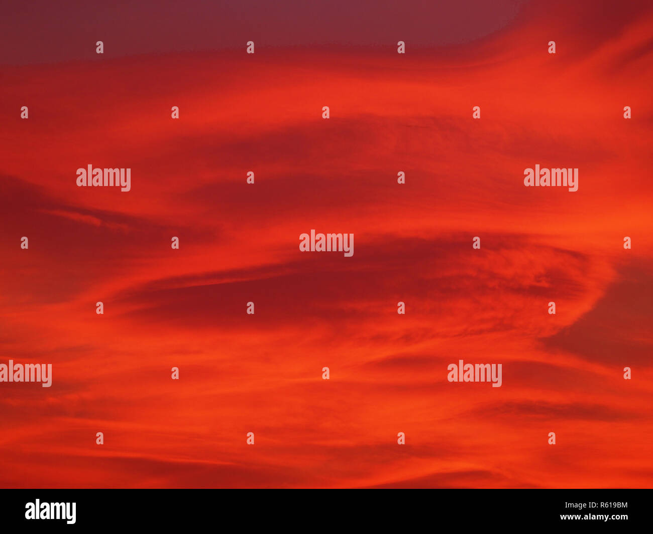 red sunset sky with clouds background Stock Photo - Alamy