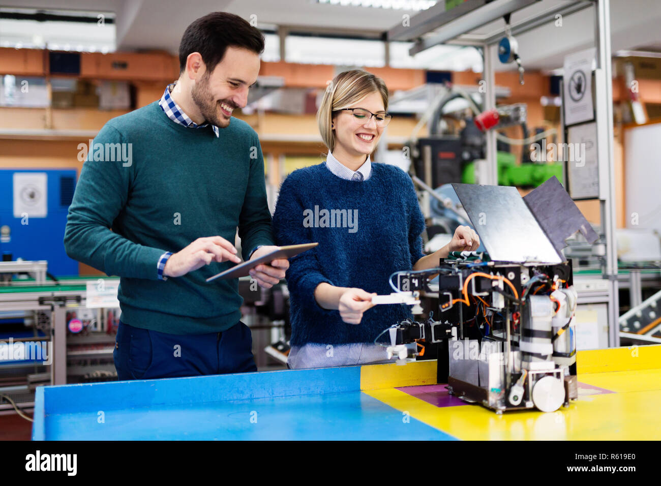Young students of robotics working on project Stock Photo - Alamy