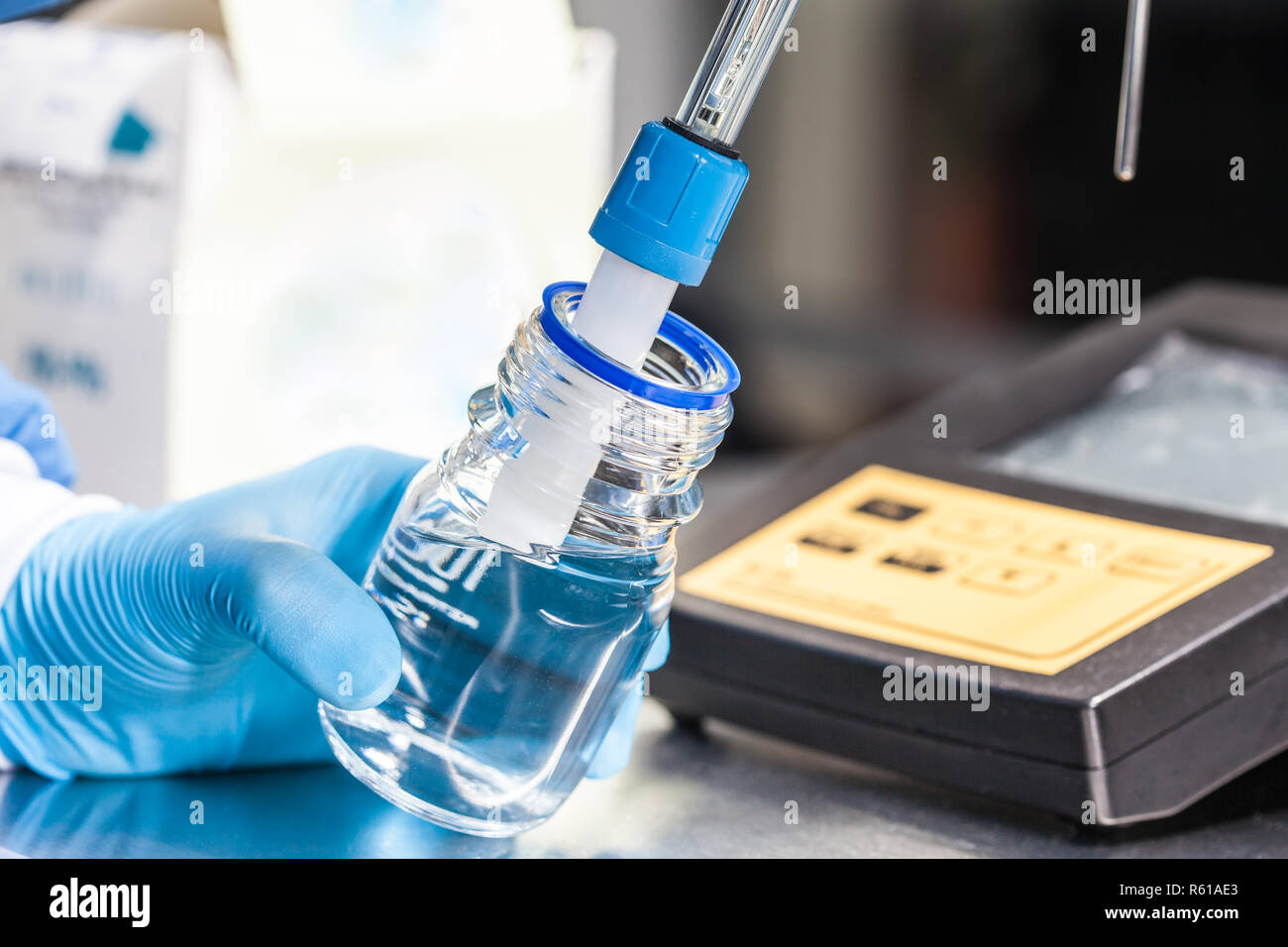 Scientist using a ph meter at laboratory Stock Photo - Alamy
