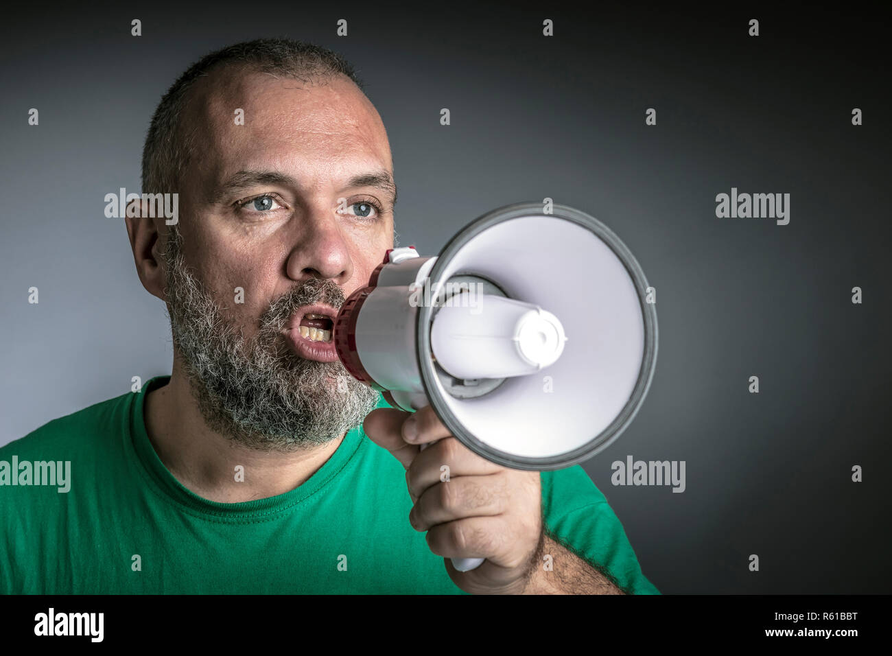 Person with megaphone hi-res stock photography and images - Alamy