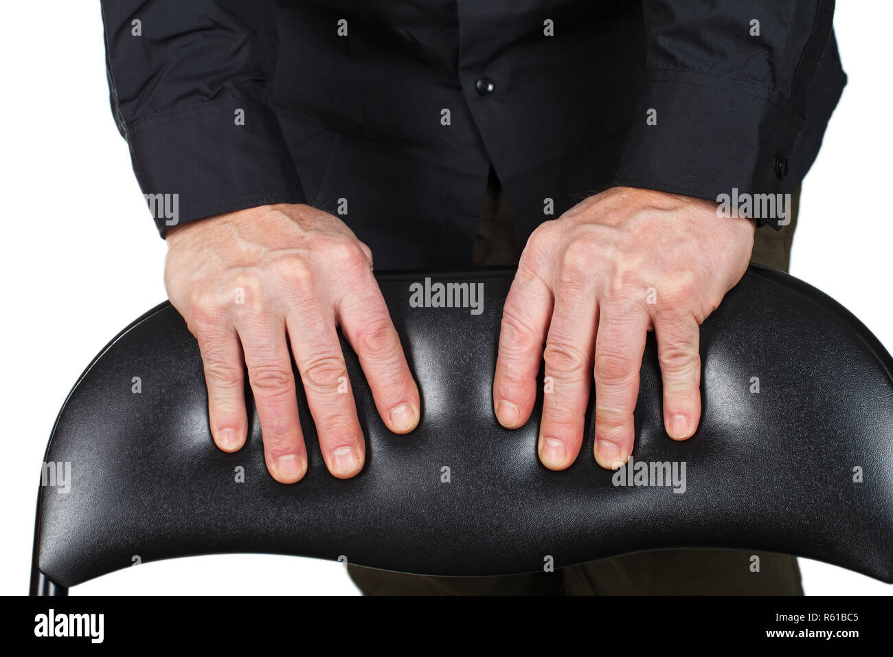 Photo of a senior man's hand resting on a chair Stock Photo - Alamy