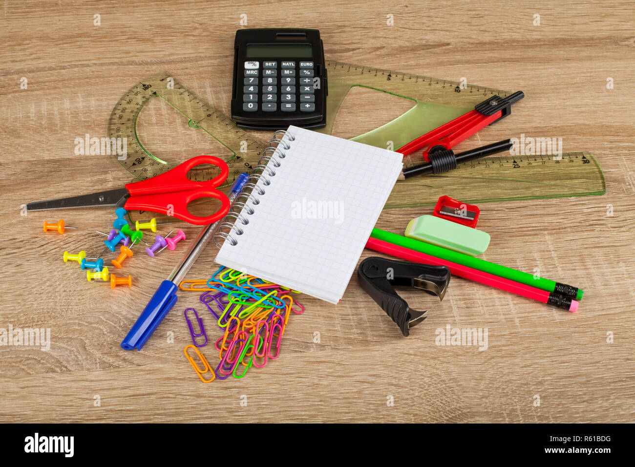 School learning tools - notebook, pen, scissors, calculator, ruler, etc ...