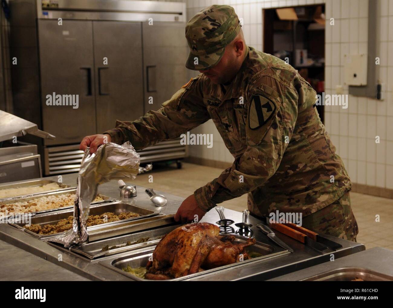 U.S. Army Cpl. Jose Ocasio, a cook assigned to 2nd Battalion, 8th ...