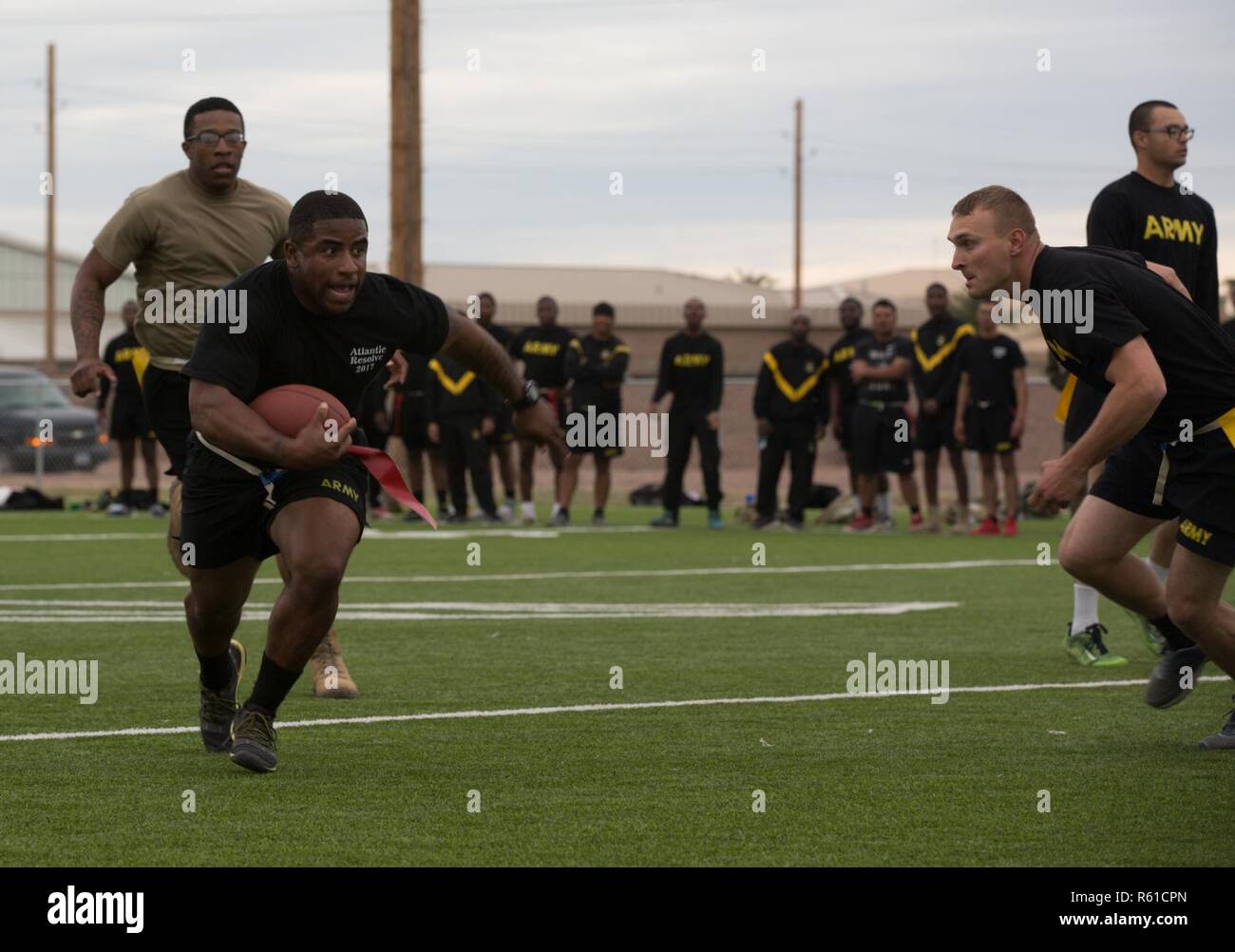 U.S. Military Police and Engineers play flag football on Thanksgiving ...