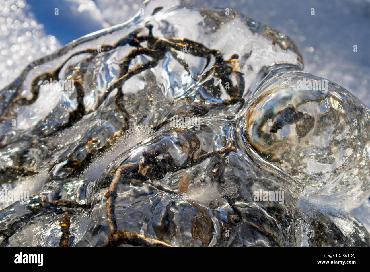 ice covered wire mesh on lakeshore breakwater, Finland Stock Photo - Alamy