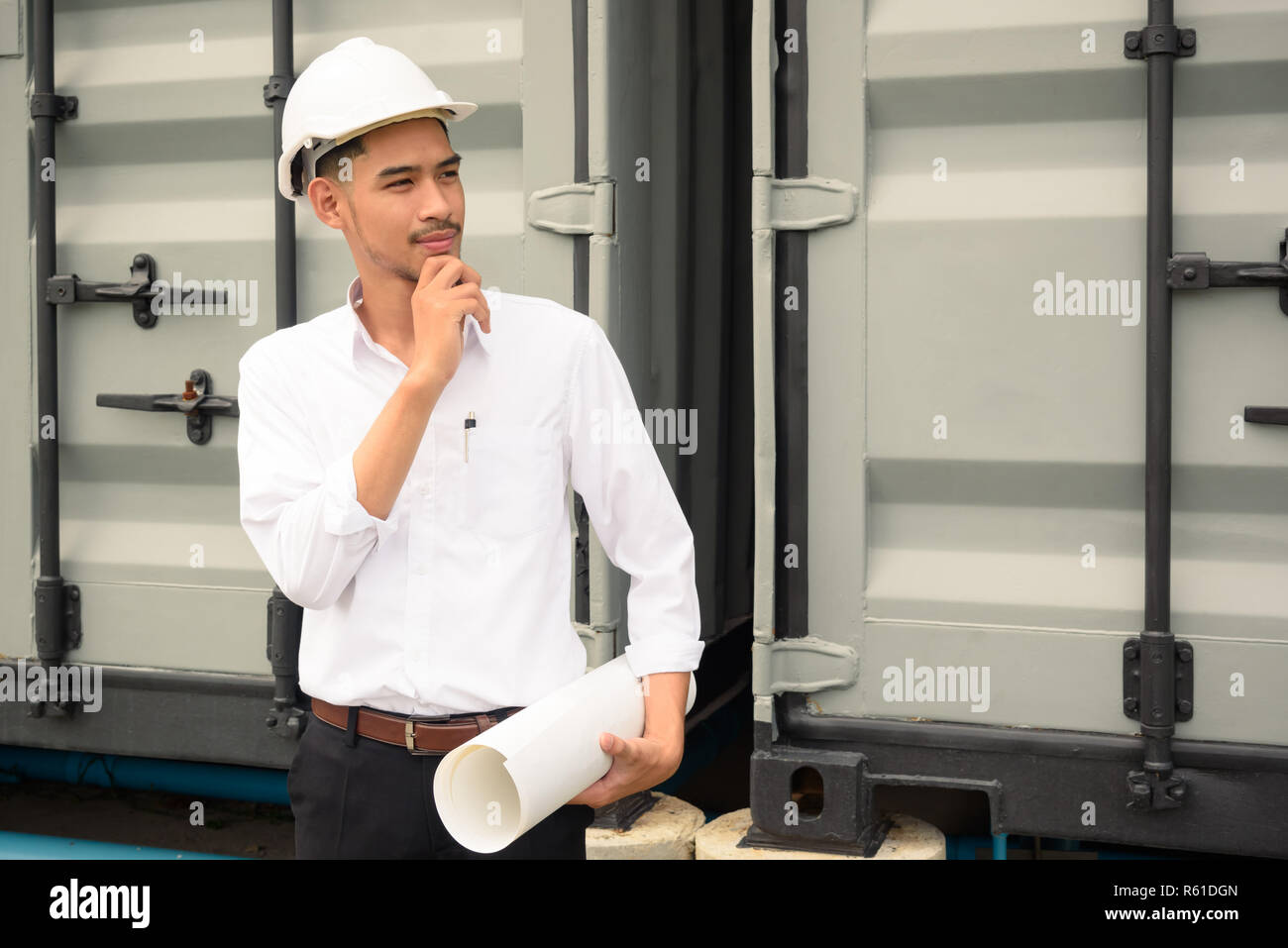Young asian engineer at construction site building Stock Photo - Alamy