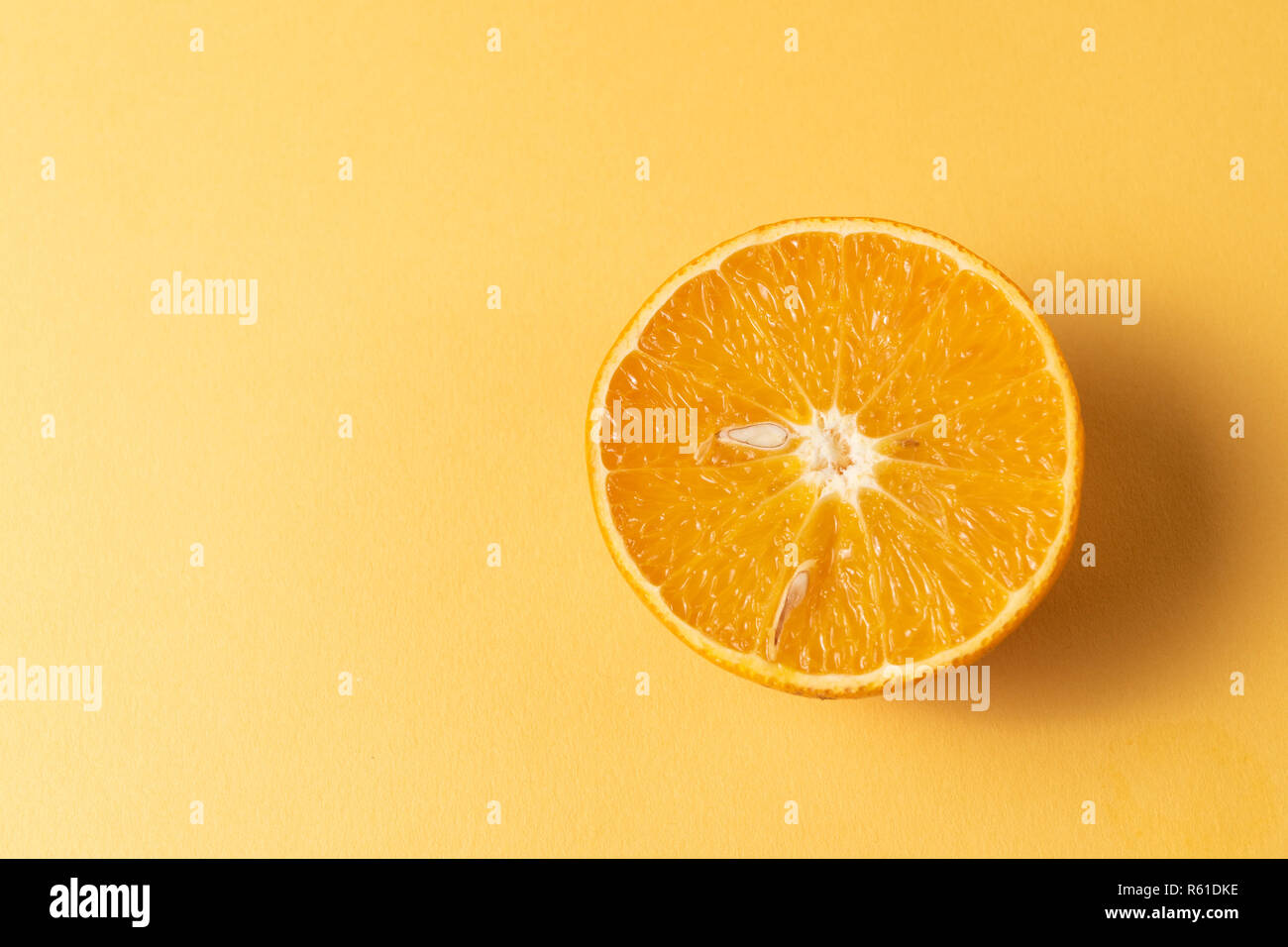 Flat lay view Orange juicy ripe mandarin or tangerine fruit , cut in ...