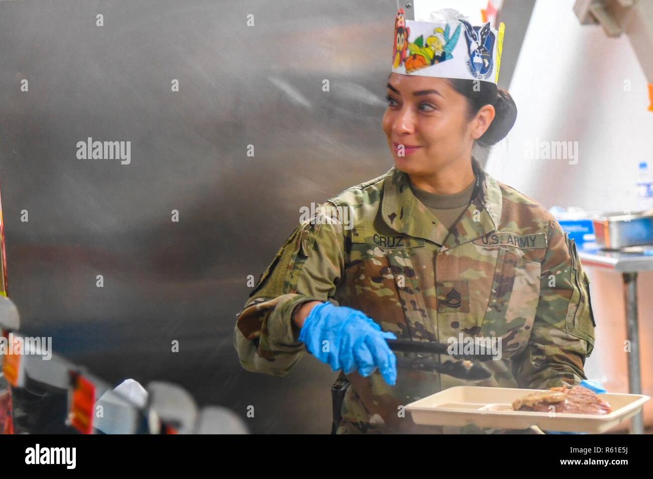 U.S. Army Soldiers assigned to Task Force Destiny serve a Thanksgiving ...