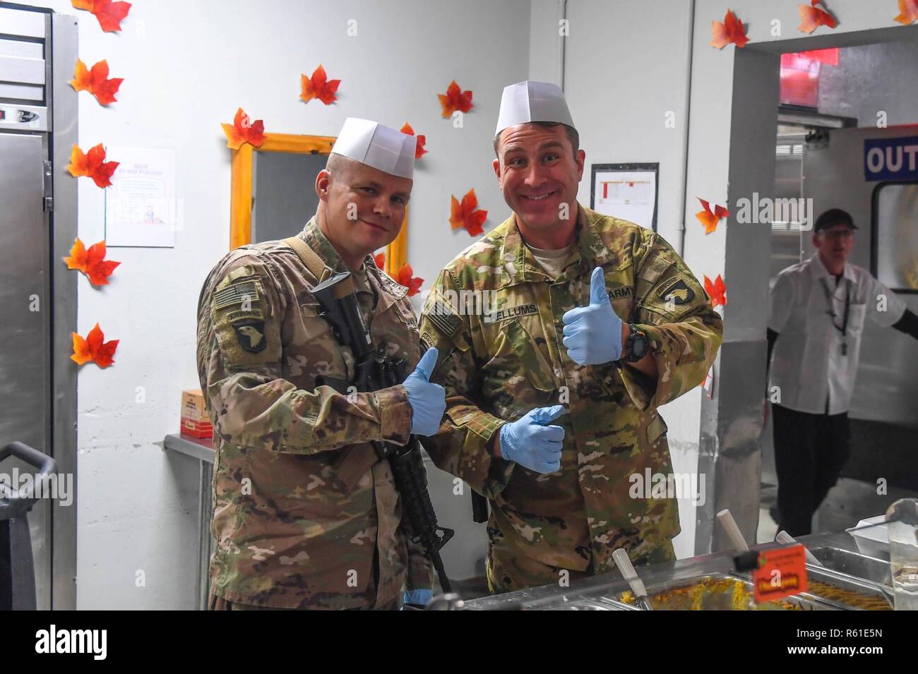 U.S. Army Soldiers assigned to Task Force Destiny serve a Thanksgiving ...