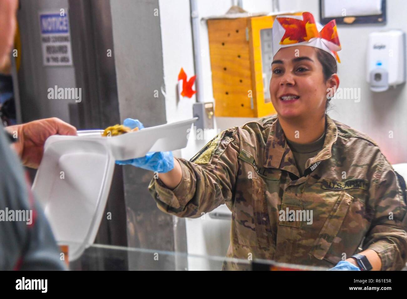 U.S. Army Soldiers assigned to Task Force Destiny serve a Thanksgiving ...