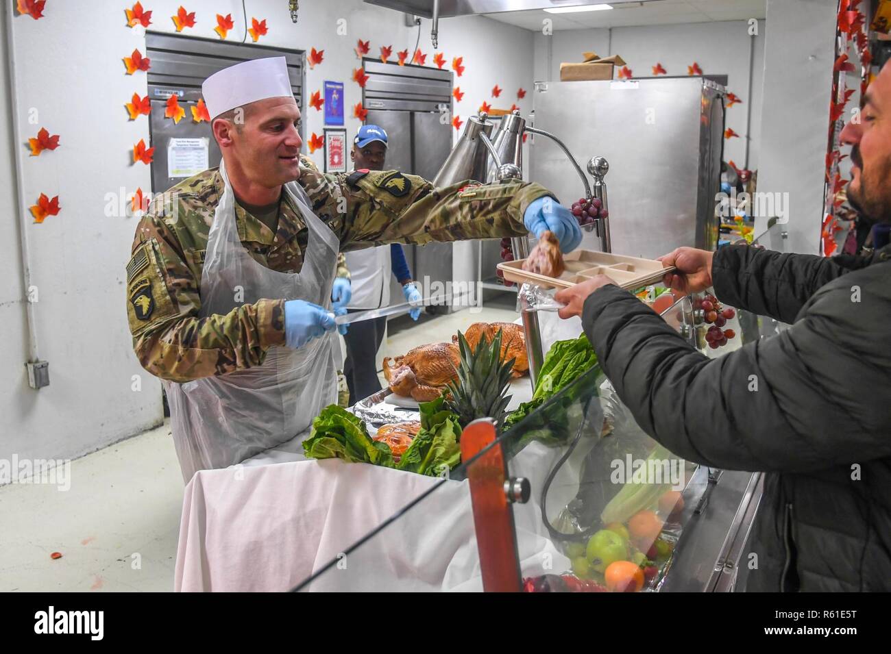U.S. Army Soldiers assigned to Task Force Destiny serve a Thanksgiving ...