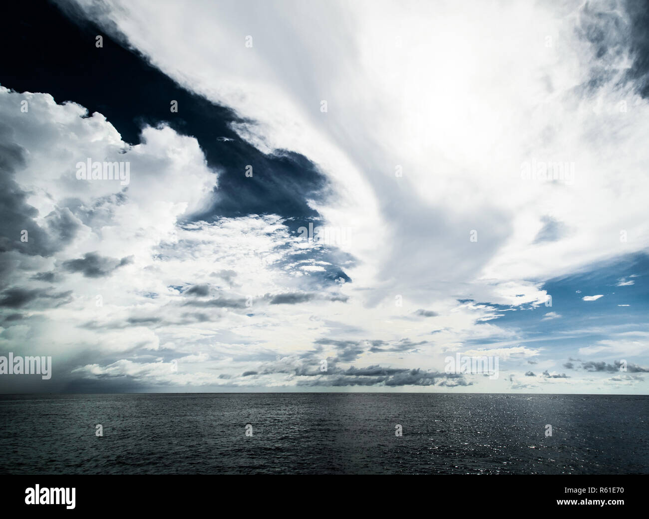Dark clouds in open ocean Stock Photo - Alamy