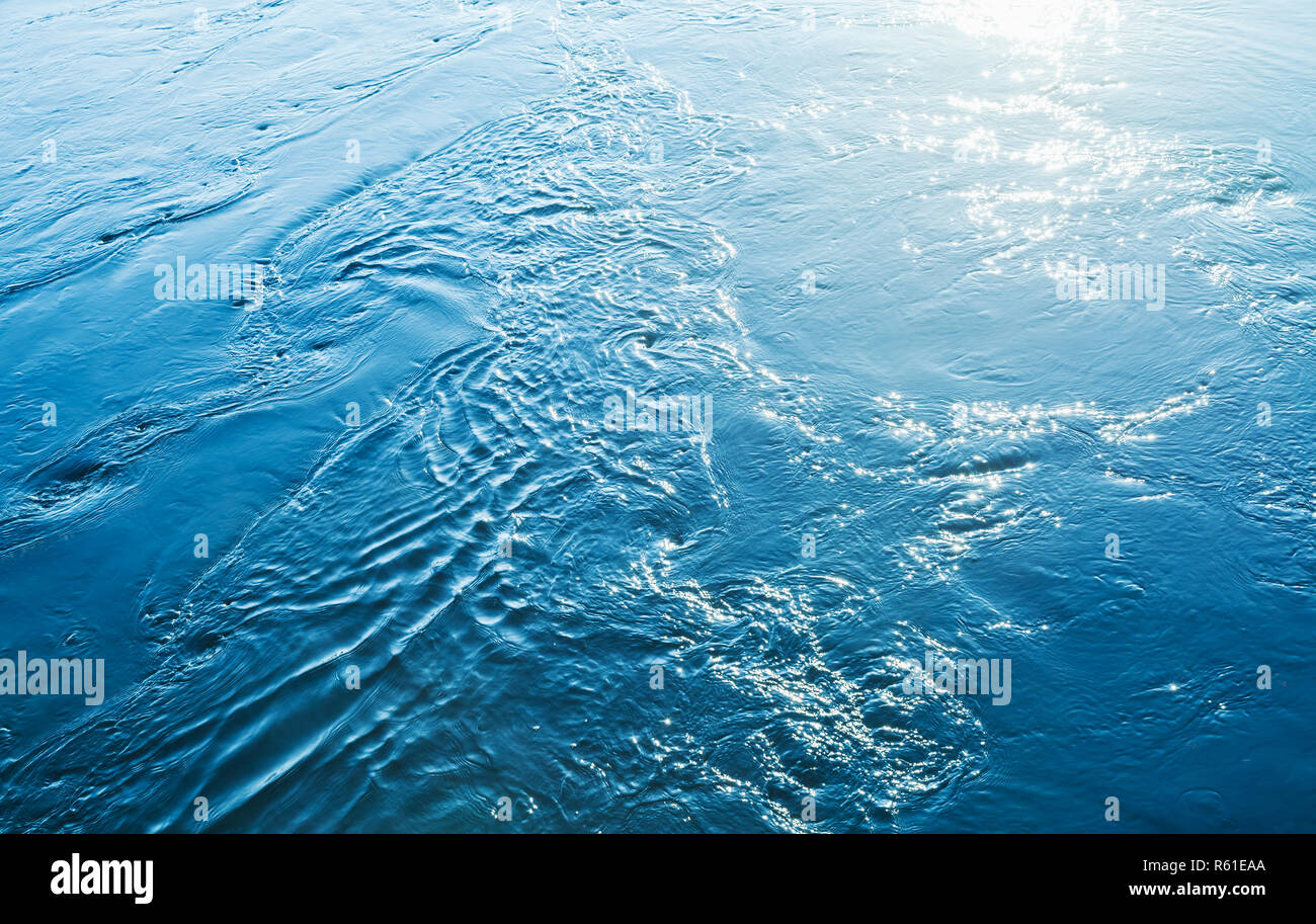 Shiny blue sea water, natural background photo texture Stock Photo - Alamy