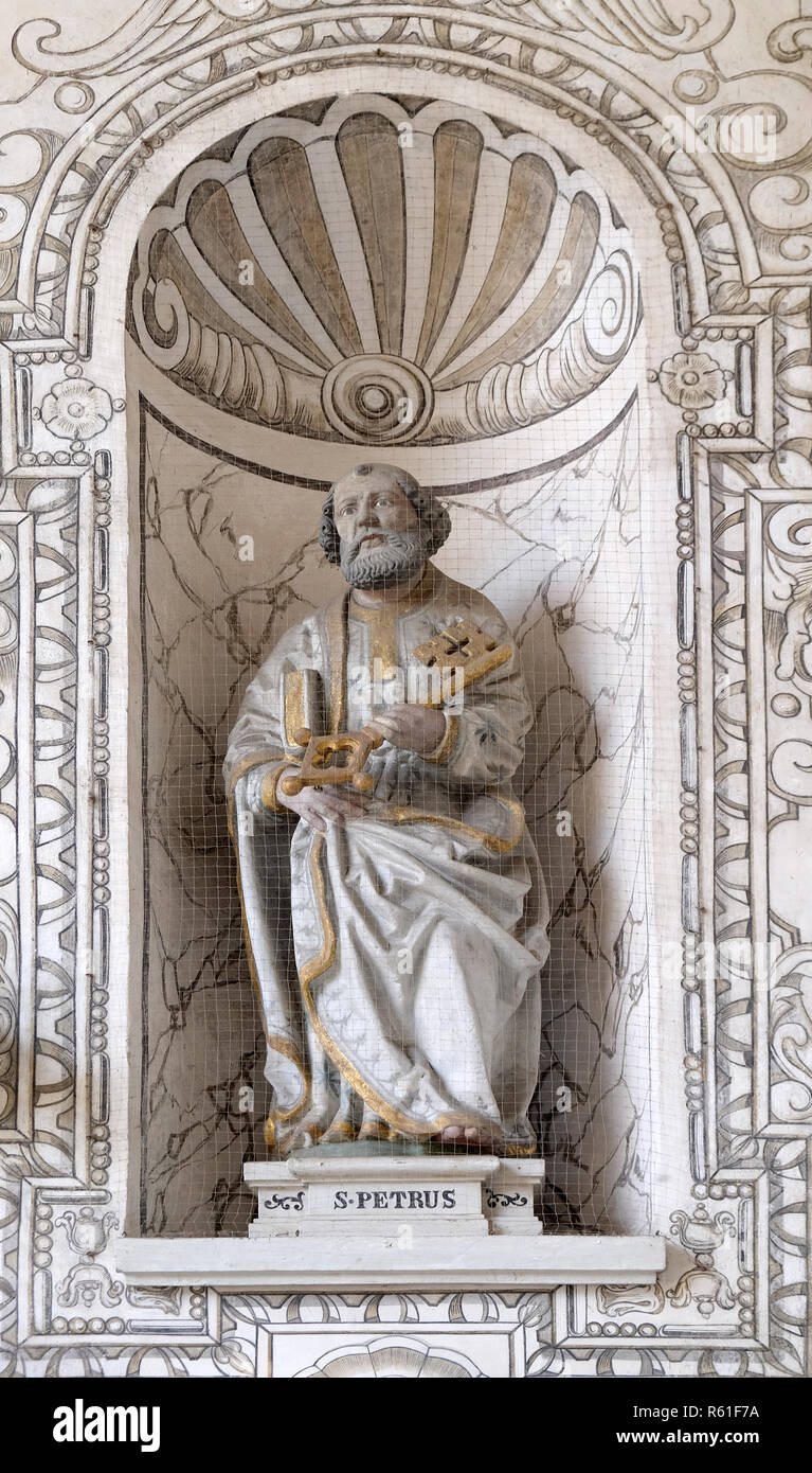 Saint Peter statue on the facade of the church of St. Leodegar in ...