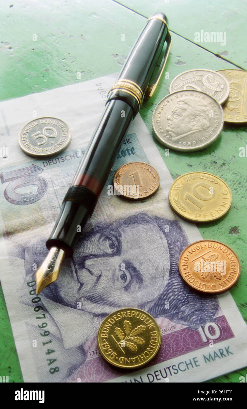 Ink Pen with Currency Stock Photo - Alamy