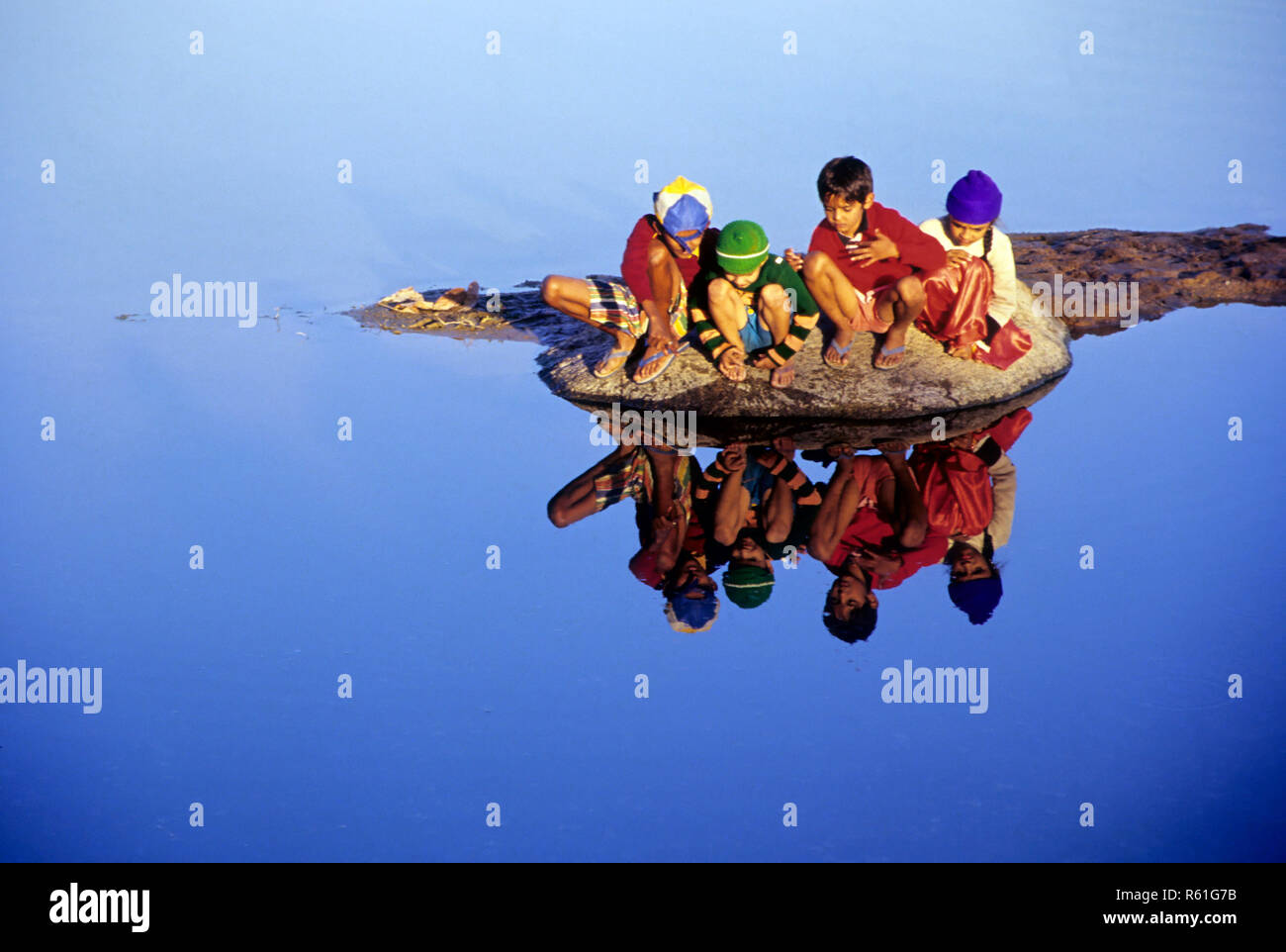 Children playing in pond hi-res stock photography and images - Alamy