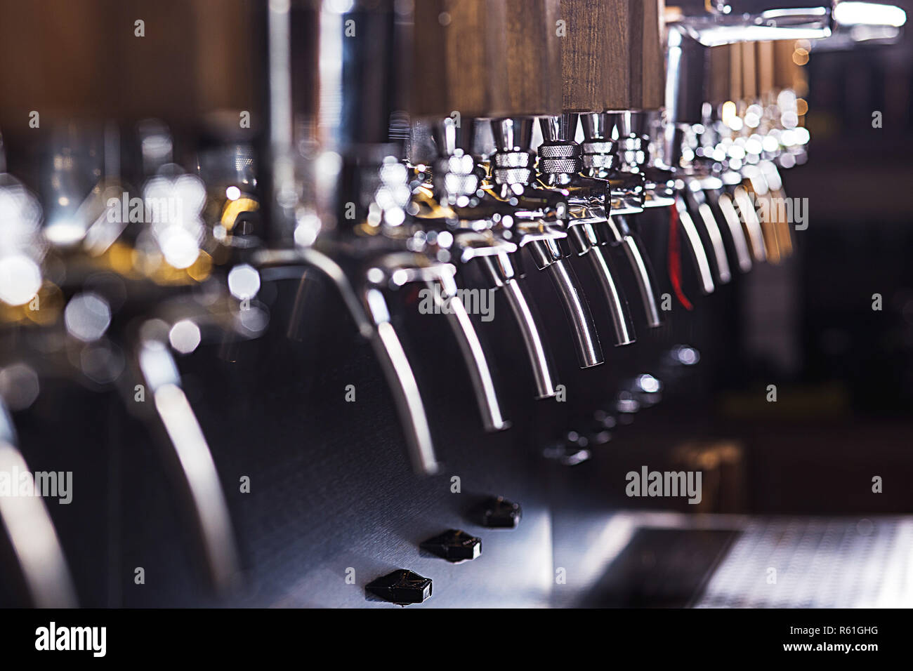 Beer taps in a pub Stock Photo - Alamy