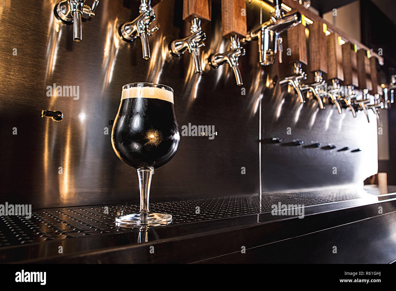Beer taps in a pub Stock Photo - Alamy