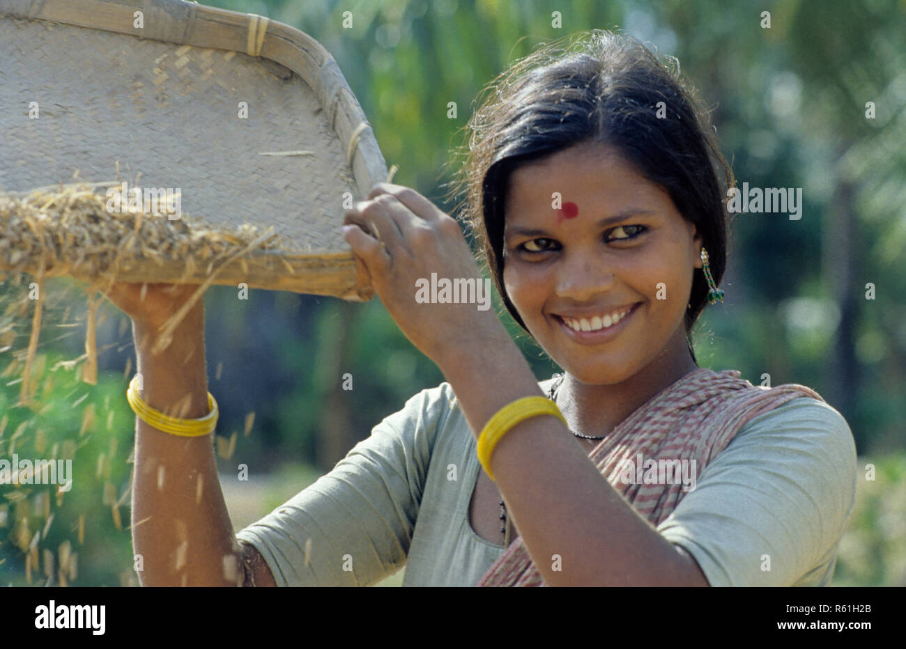 Women winnowing wheat hi-res stock photography and images - Alamy