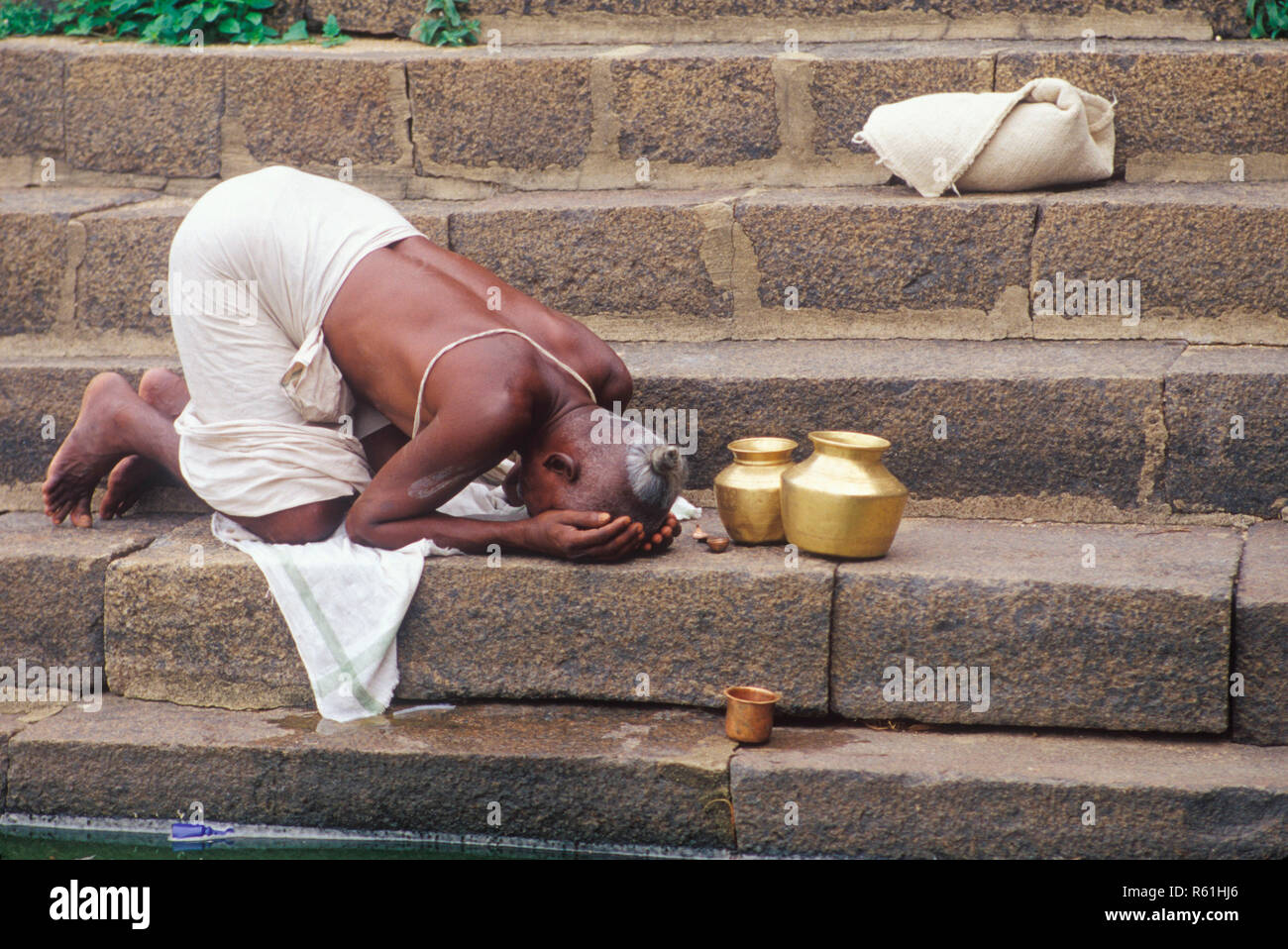 Man doing namaste, ekambaranath temple, kanchipuram, tamil nadu, india ...