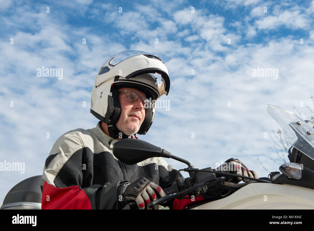 portrait of a senior biker on his motorcycle Stock Photo - Alamy